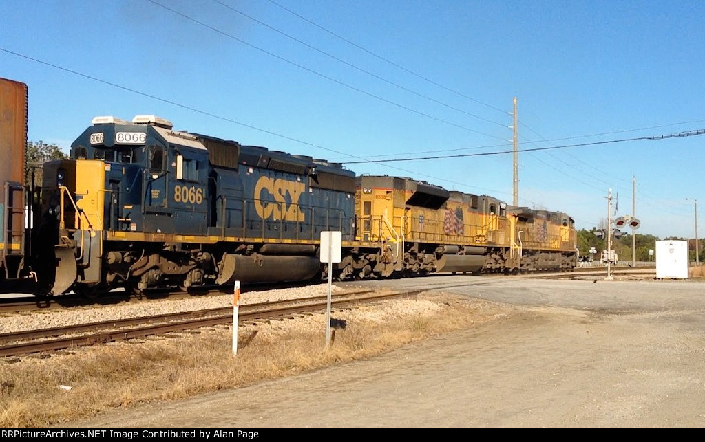 UP 6000, 8508, and CSX SD40-2 8066 roll NB mixed freight across the Tatum Road crossing